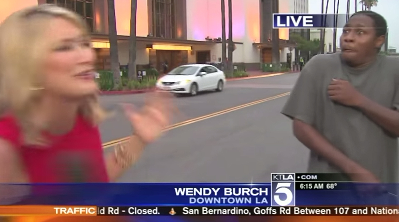 WATCH: Reporter's videobomb reaction couldn't be more perfect