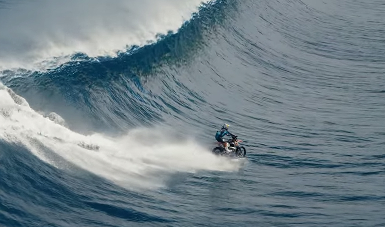 WATCH: Stunt rider surfs waves...on a bike
