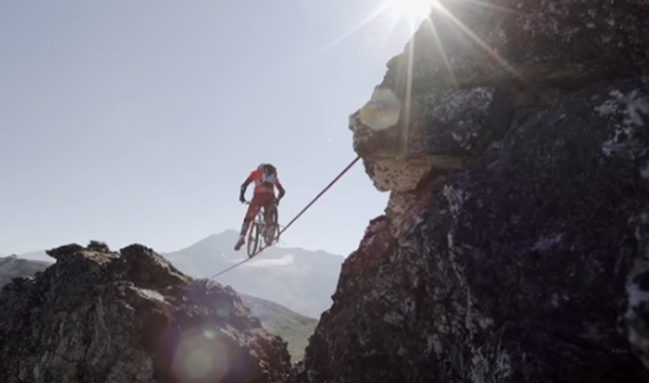 WATCH: Cycling a tightrope in the mountains