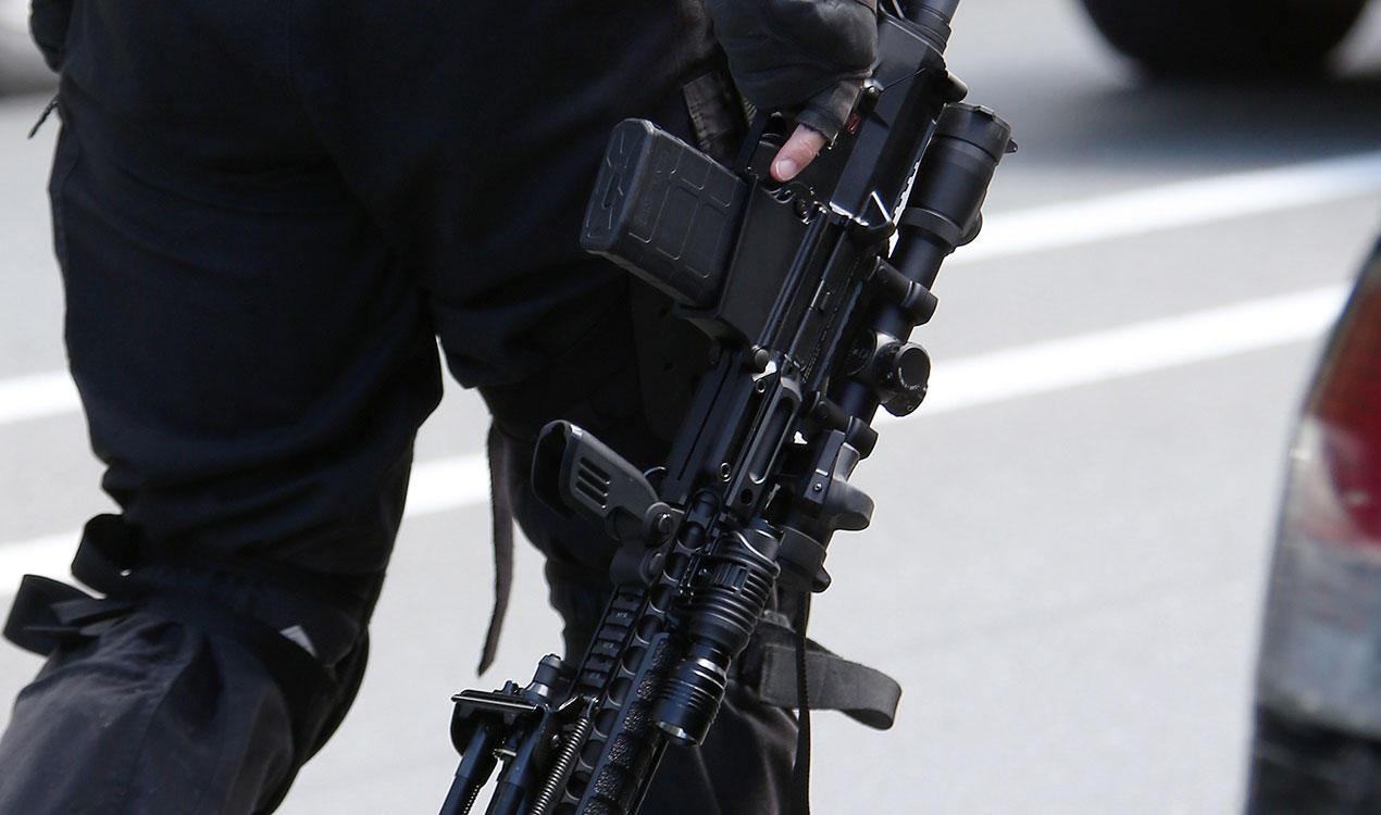 Armed police block road in Tauranga