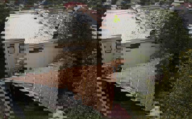 'Is that your roof or mine?' Auckland roof torn off house