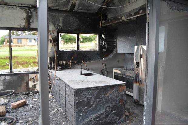 Alleged serial arsonist laughs in court