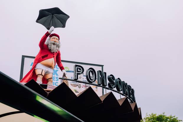 Gender-fluid Santa Claus on display above Auckland mall