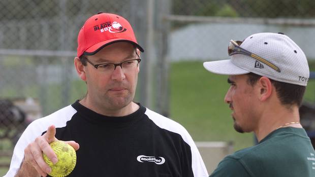 Former Black Sox softball coach Don Tricker speaks to Martin Devlin