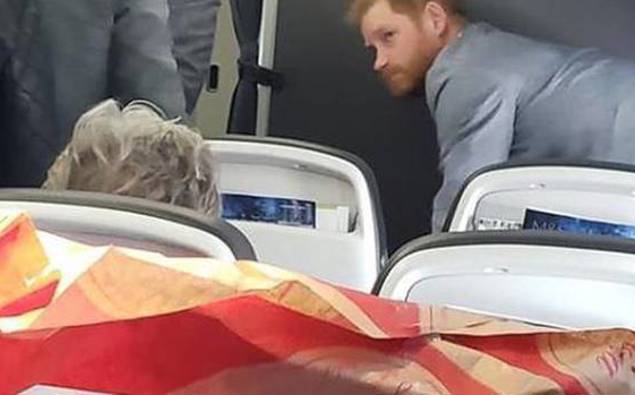 Very Tired Prince Harry Spotted On British Airways Flight