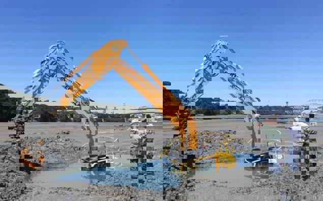 Digger stuck in the mud for three days at Auckland beach