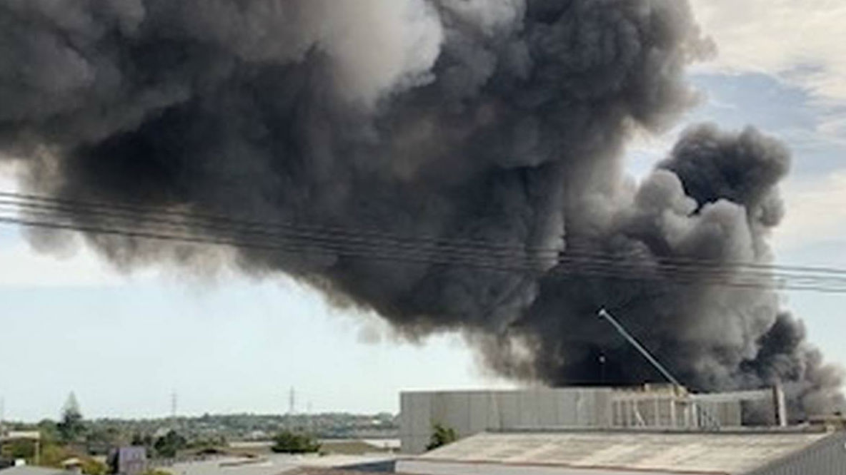 Thick black smoke billowing from giant blaze in Takanini