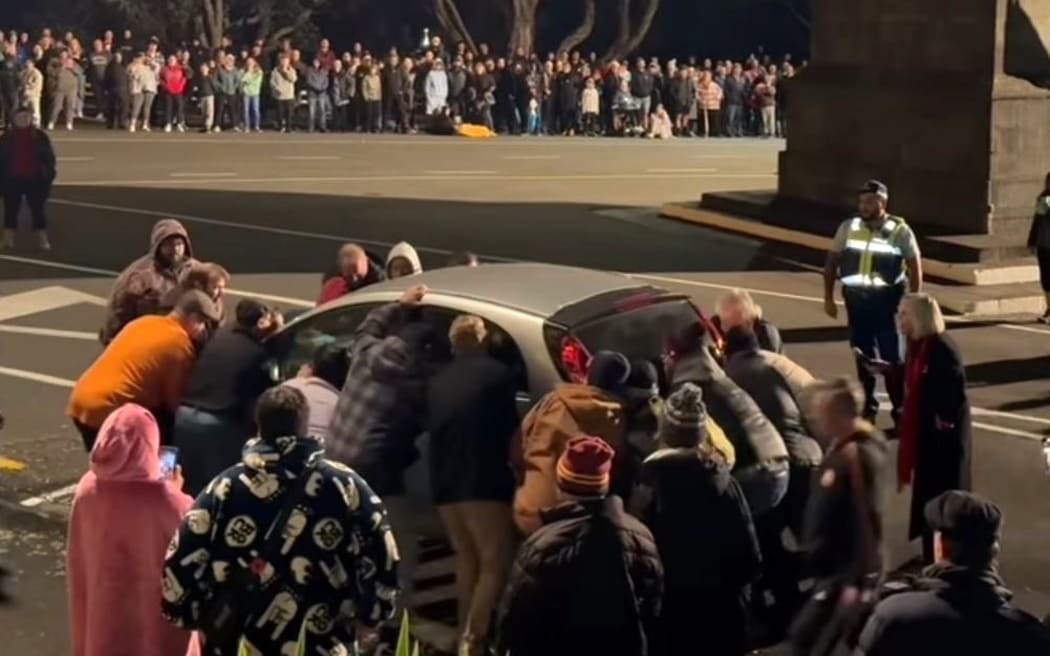 Watch: Car parked in 'worst possible place' lifted by Anzac attendees