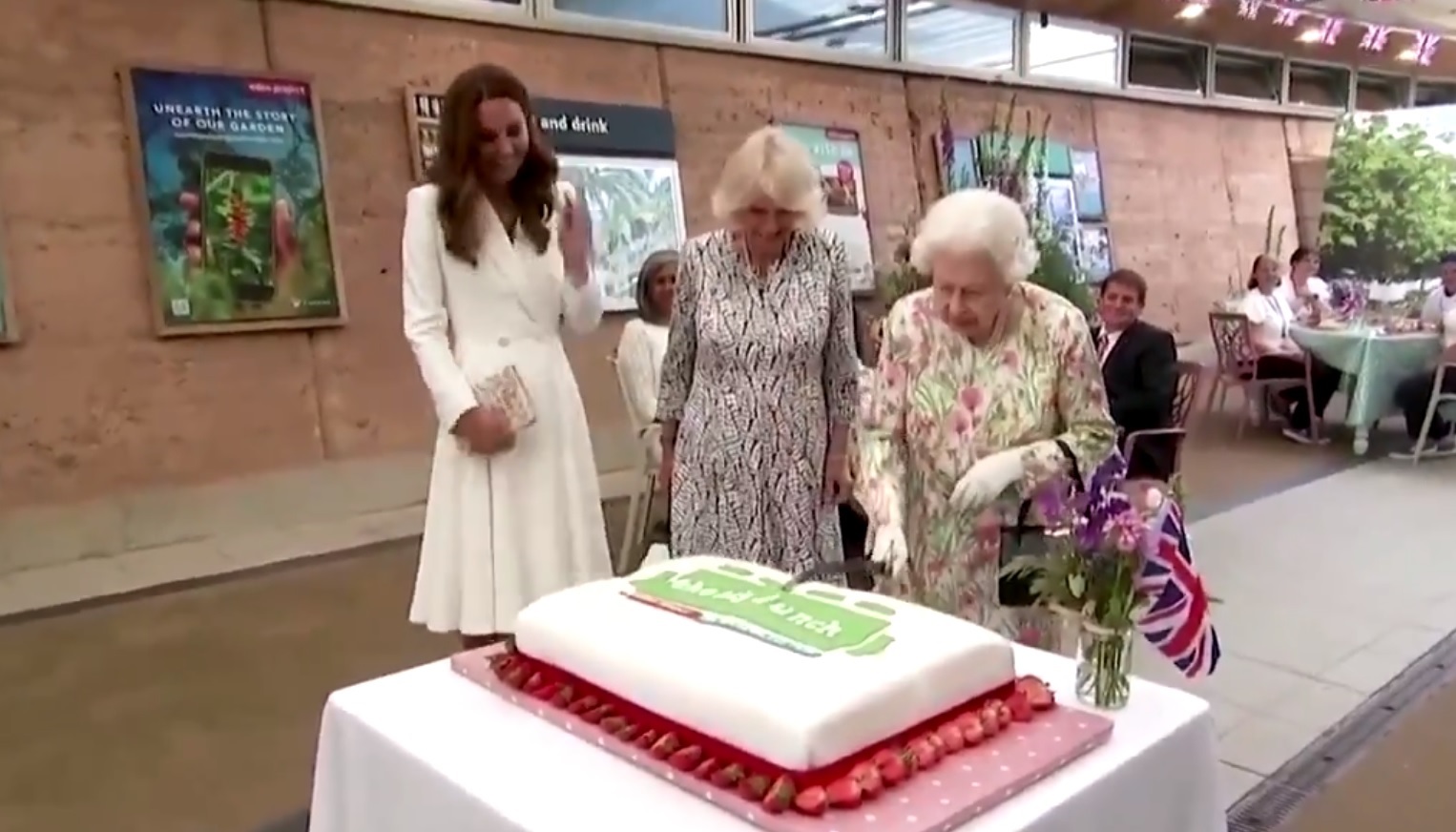 Watch: The Queen insists on cutting cake with a sword at G7 Summit