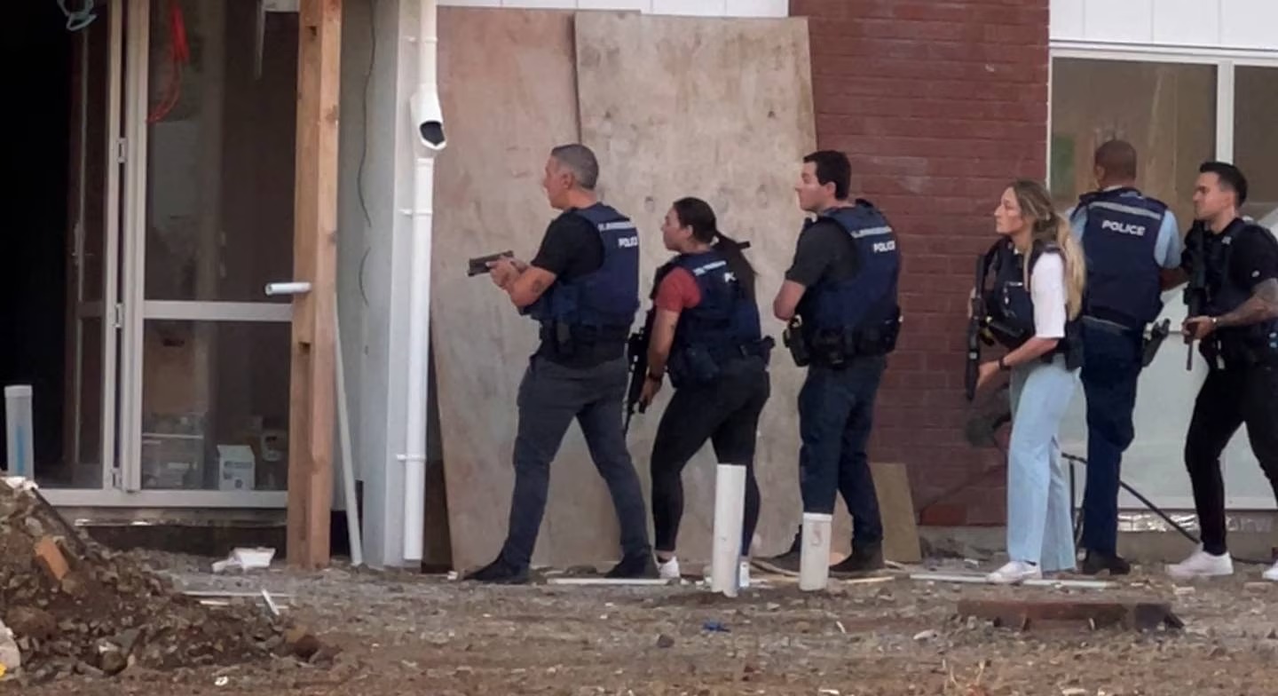 Watch: Armed police swarm central Auckland suburb after violent incident