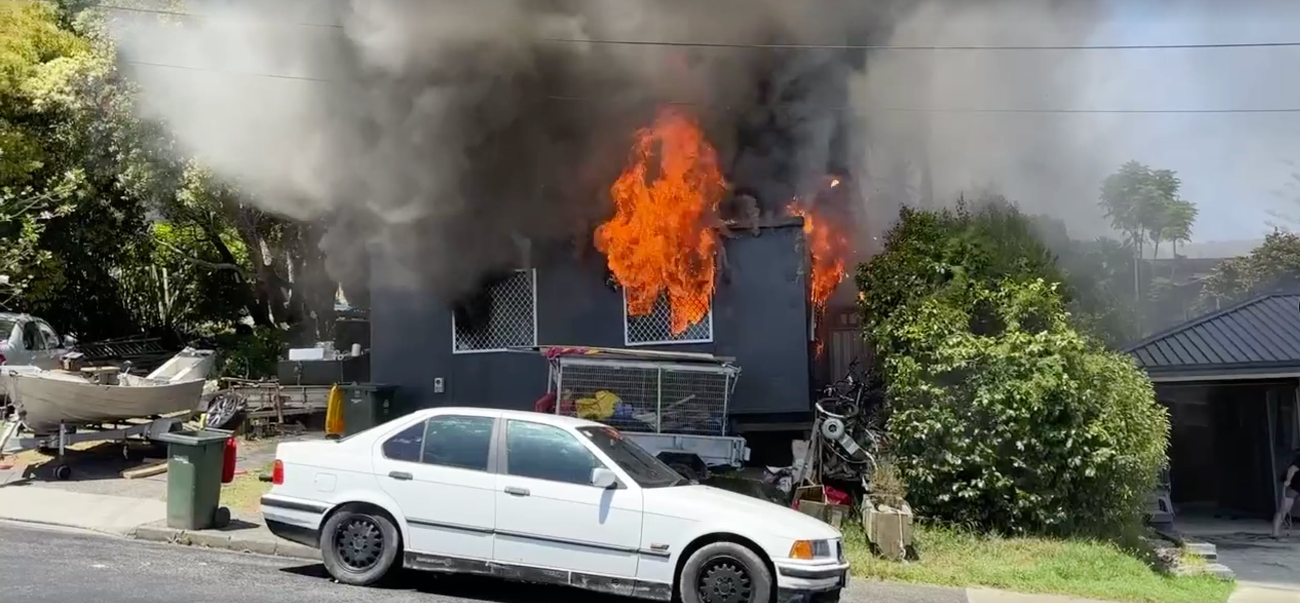 Fire services battle dramatic cabin fire in Cockle Bay, East Auckland