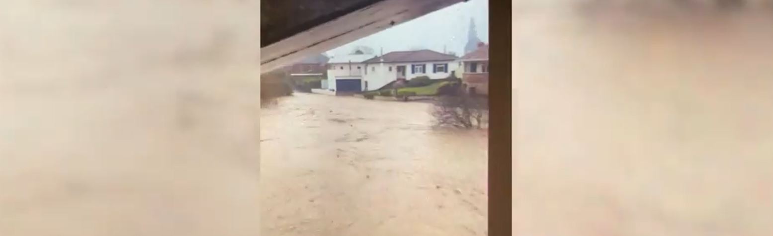 Evacuations in Nelson after river breaches banks; weather warnings ...