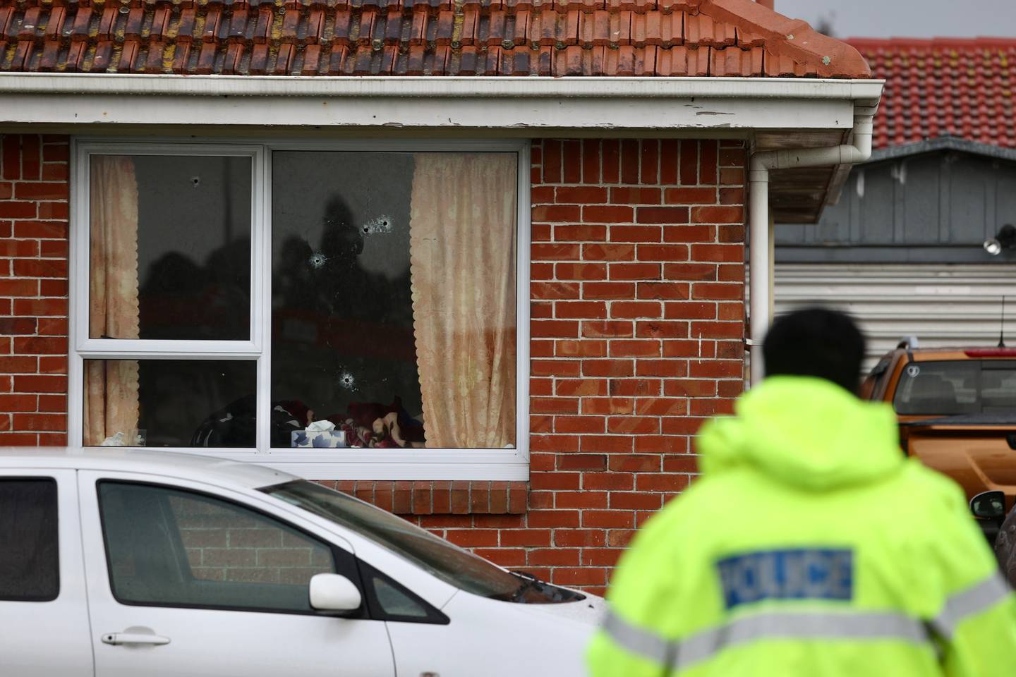 'Lucky escape' - Flatmates shot at eating dinner, one injured, in ...