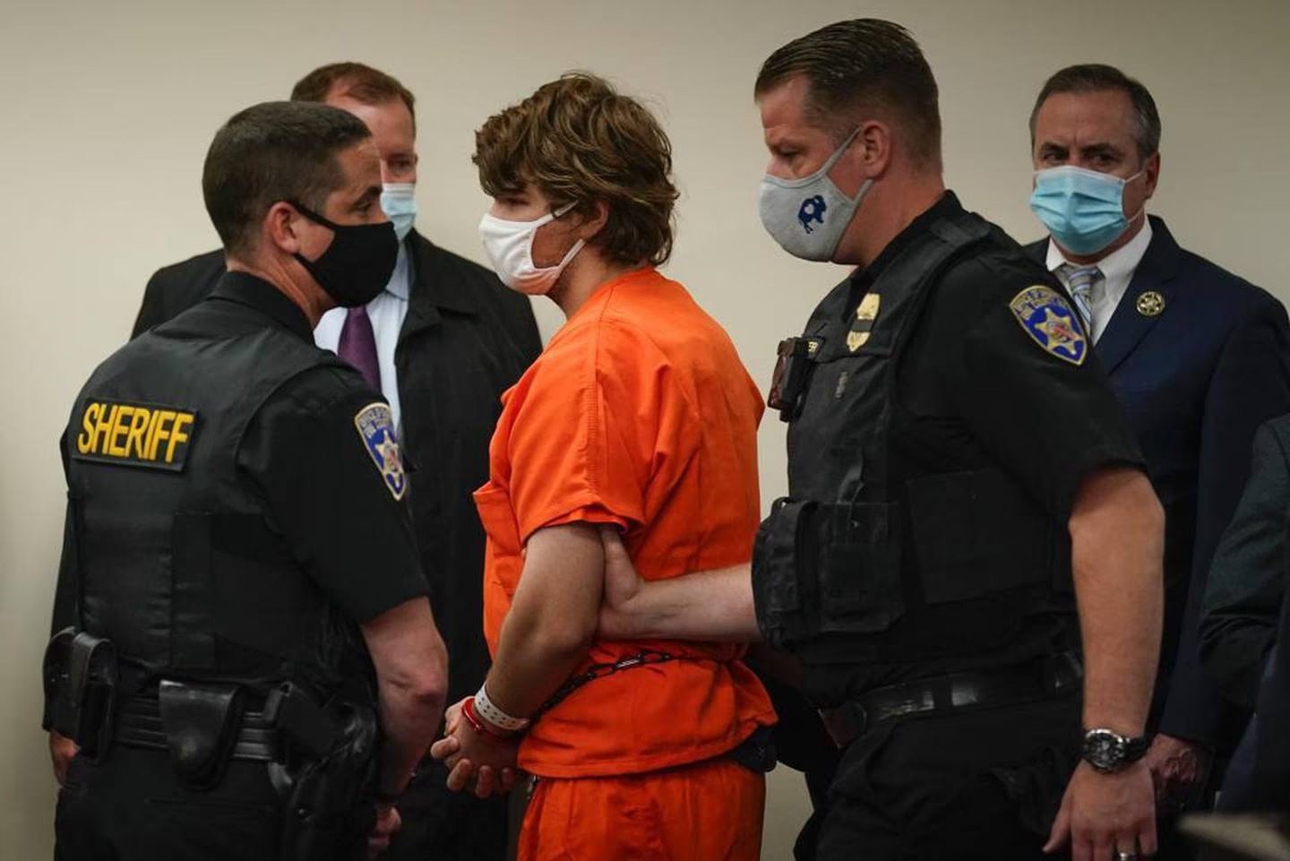 Watch: White supremacist killer rushed from court after family's fury